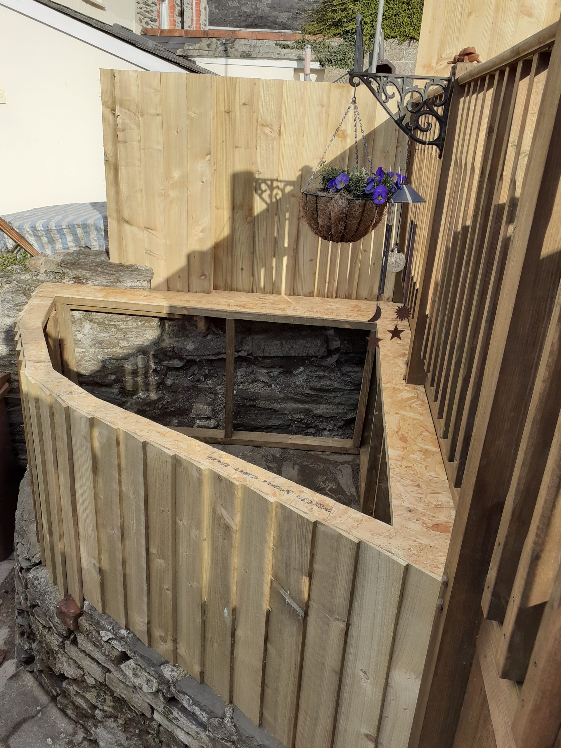 Raised Pond with Waterfall Project | Sasaquatics Garden Pond Builders